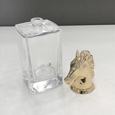 China Superfície lisa Zamac Botella de perfume tampa 32 * 56 * 57mm cor personalizada 10000pcs à venda