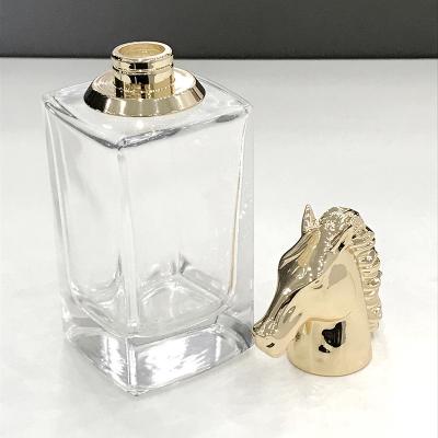 China Superfície lisa Zamac Botella de perfume tampa 32 * 56 * 57mm cor personalizada 10000pcs à venda