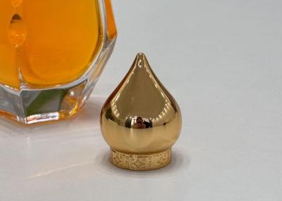China Elegantes tampas de garrafas de perfumes de liga de zinco à venda