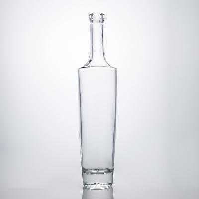 Cina Bottiglia di liquore in vetro rotondo con tappo personalizzato per whisky rum vodka industriale in vendita