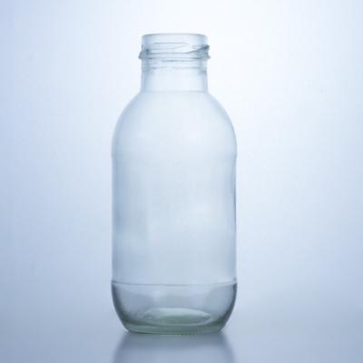 Cina 300 ml Bottiglia rotonda di latte in vetro con coperchio Soluzione di conservazione liquori Manipolazione della superficie deccale in vendita