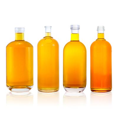 Cina Bottiglie di liquore in vetro da 500 ml 700 ml 1000 ml con tappo a sughero o a vite trasparente o personalizzato in vendita