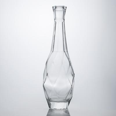 Cina Alcolici industriali forma personalizzata pera in rilievo Super flint Materiale bottiglia di vetro con sughero in vendita