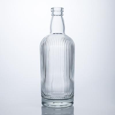 Cina Bottiglia di vetro a forma rotonda da 750 ml con strisce e sughero per rum vodka whisky tequila gin in vendita