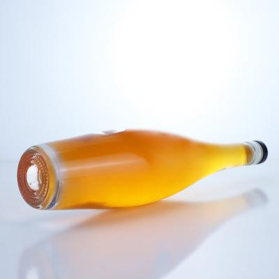 Cina Bottiglia rotonda di liquori alta e sottile da 500 ml/700 ml con capo di sughero chiaro o colore personalizzato in vendita