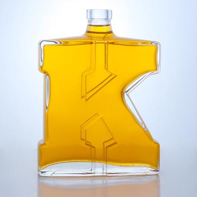 Cina Bottiglia di vetro di pietra chiara 750 ml con forma unica per Gin Rum Champagne Brandy Whisky in vendita