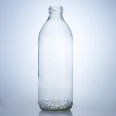 Cina Bottiglie di vetro trasparenti da 1020 ml con tappo a vite e forma unica in vendita