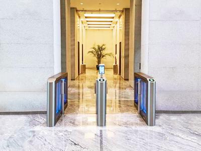 China Torniquete de puerta abatible de velocidad inteligente para seguridad de entrada en venta