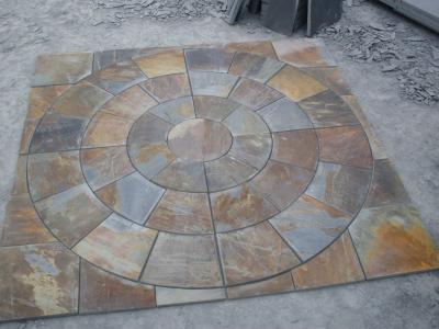 China Piedra de pavimentación de piedra de la pizarra del medallón de la pizarra del círculo multicolor oxidado del piso para la yarda en venta