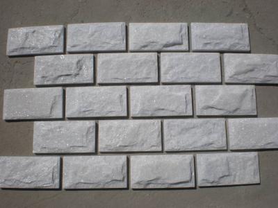Chine Revêtement extérieur de pierre de quartzite de tuile de mur en pierre de quartzite de neige de pierre blanche de champignon à vendre