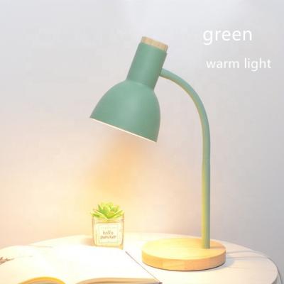 Cina Nordic Simple Modern Dormitory Study Office Desk Lamp Solid Iron Wood Student Led Eye Protection Reading Bedside Lighting Table Light in vendita