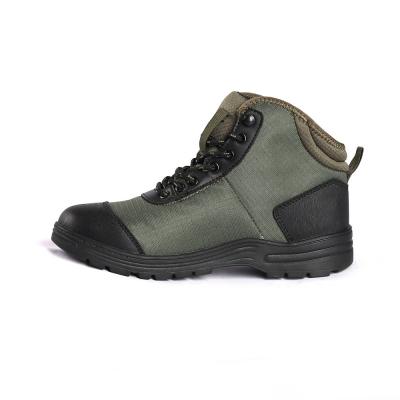 Cina Shengjie Factory Standard Unisex Scarpe da trekking Oxford tessuto Nubuck cuoio rivestimento superiore a maglia e suole in PU Scarpe da esterno in vendita