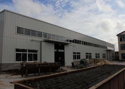 Cina La storia multi- ha personalizzato il grado Q235 durevole/Q345 del magazzino della struttura d'acciaio in vendita