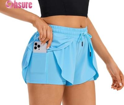 China Women's Flowy Skirted Athletic Gym Fitness Shorts 2-in-1 Wrap Running Shorts with Pocket High Waist Sportswear for Yoga Workout for sale
