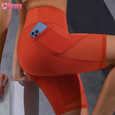 China Customized Logo Print Tight Hot Sale Pocket Mesh Stitching High Waist Buttocks Lifting Slimming Yoga Shorts Leggings Wholesale for sale