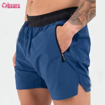 China Custom logo on Waistband Polyester Pockets Split Hem Pour Hommes Sports Active Mens Workout Gym Athletic Shorts for Men for sale