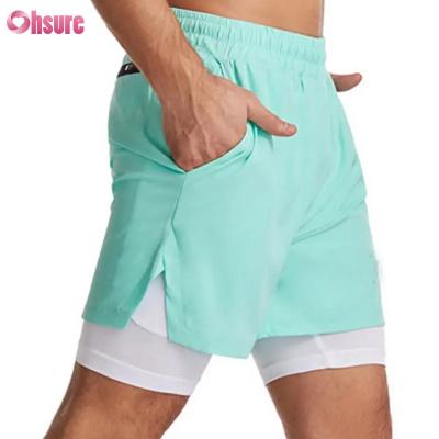 China Custom Logo Design Polyester 2 in 1 Gym Shorts Fitness Workout Clothing Mens Standard Logo Solid Short Swim Liner Fitness Shorts for sale