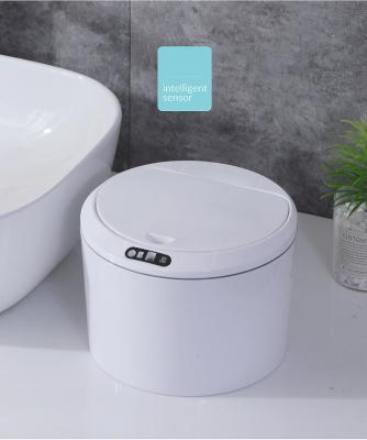 中国 Home Living Room Creative Light Luxury Style With Lid Desktop Smart Trash Can Car Sensor Automatic Trash Can 販売のため