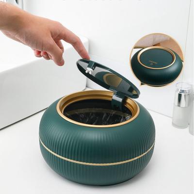 中国 Source Factory Direct Desktop Trash Bin with Cover Small Storage Paper Basket Desktop Storage Box 販売のため