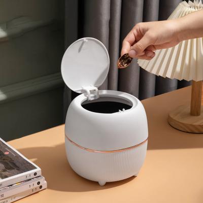 中国 Small Desktop Creative Mini Trash Can Candy Colored Desk Press Round Covered Wastebasket Storage Bin 販売のため
