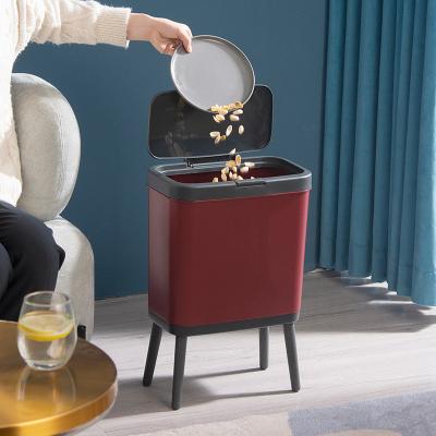 中国 House Rectangular Push Type Plastic Trash Can with Lid Kitchen Trash Can with Legs 販売のため