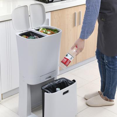 中国 Double-layer Kitchen Household Dry and Wet Separation with Lid Deodorant Pedal Sorting Trash Can 販売のため