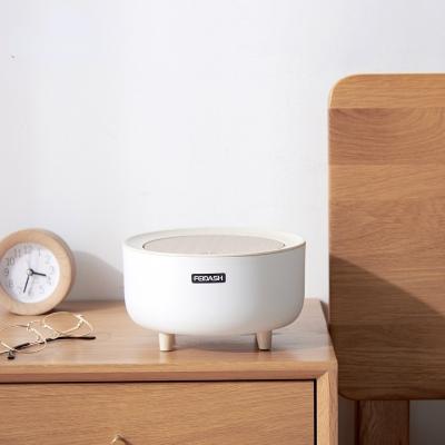 中国 Wood Grain Round Household Desktop Mini Simple Large-capacity Wastepaper Basket Plastic High-footed Trash Can 販売のため