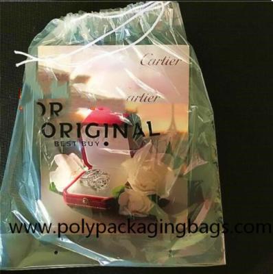 中国 35x40cm 0.06mm透明なLDPEのドローストリングの貯蔵袋 販売のため