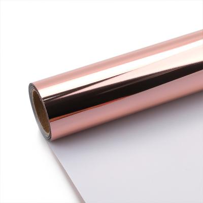 中国 Waterproof Latex Shiny Rose Gold Vinyl Sticker Advertising Polymeric Vinyl Sticker 販売のため