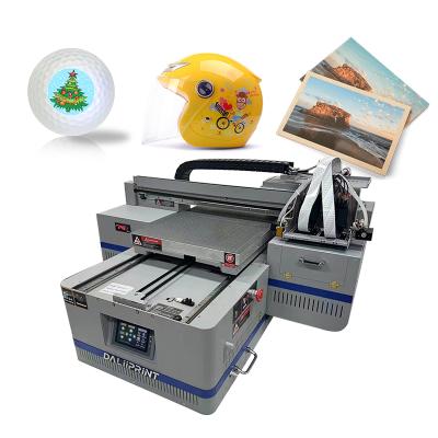 China Multifunction Glass Stone Leather Wood PVC 4060 Size Phone Case Printing Machine Label Sticker Uv Flatbed Printer for sale