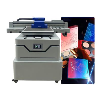 China Factory Price 6090 Price with 3 I3200/XP600 Heads CCD Camera,and Rotary Attachment UV Flatbed Printing for Multi-Material for sale