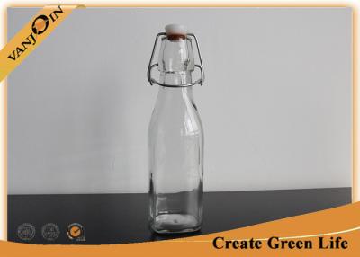 Cina La bevanda di vetro sigillabile imbottiglia le piccole bottiglie di vetro 250ml con i coperchi e la cima inossidabile dell'oscillazione in vendita
