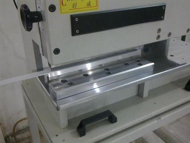 CWVC-3 PCB Depaneling Machine in operation