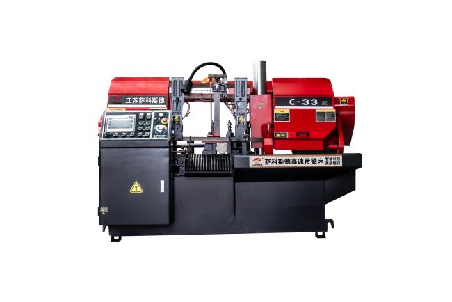 Close-up view of band saw cutting mechanism and blade guidance system