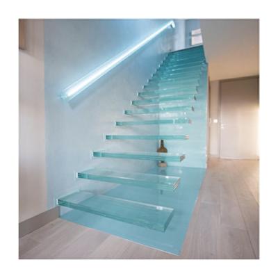 Cina Concrete stairs clear glass staircase frameless floating glass stair in vendita