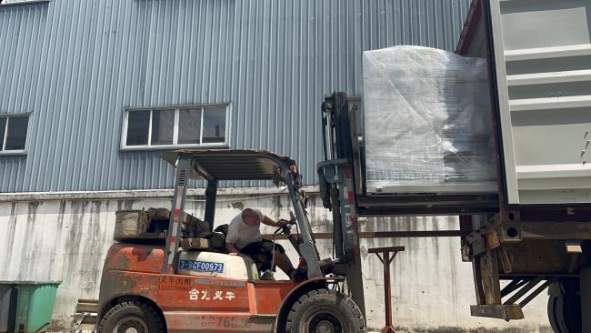 TL-1000 air bubble film machine packed for shipment with protective wrapping