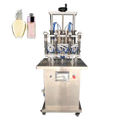Cina Good Price Semi Automatic Pneumatic Fragrance Cologne Perfume Liquid Oil Vial Bottle Vacuum Refill Fill Bottling Machine Small in vendita