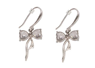 Cina Modelli bianchi d'argento di Bowknot degli accessori dei gioielli di modo del costume degli orecchini in vendita