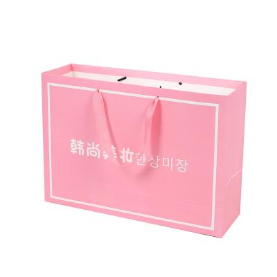 Cina 100g-130g Kraft ha riciclato la borsa di carta Carry With Handle facile del regalo in vendita
