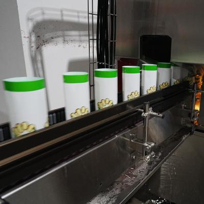 Cina Etichettatore automatico a manica 42.000 BPH per bottiglie da 50 a 95 mm in vendita