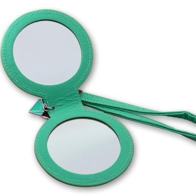 Cina la forma rotonda su ordinazione ha piegato lo specchio cosmetico di cuoio con il regalo di promozione di logo in vendita