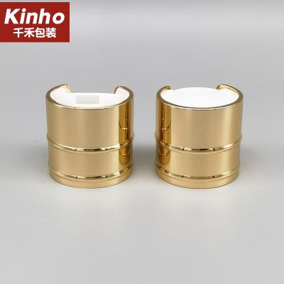 Cina Luxury Cosmetic Gold Aluminum Press Disc Top Cap 28/410 Metal Shell For Shampoo Bottle in vendita