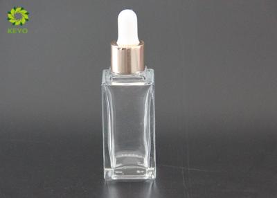 Cina il cosmetico vuoto del vetro trasparente 30ml imbottiglia la forma quadrata per olio essenziale/lozione in vendita