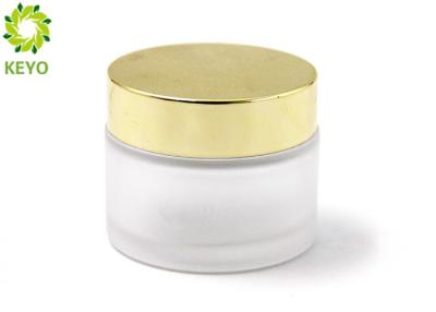 中国 金アルミニウムねじふたが付いている曇らされたガラスの化粧品のクリーム色の瓶30ml 販売のため