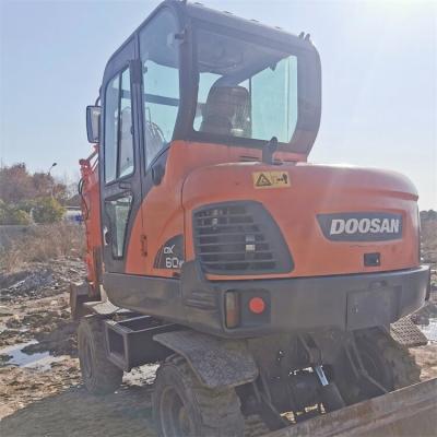 Κίνα Πολυλειτουργικός εξορυκτής τροχών DOOSAN DX60W 4TNV94L κινητήρας 5,7 τόνων λειτουργικό βάρος προς πώληση