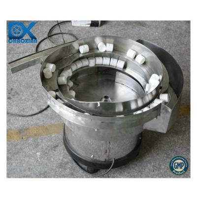 China Automatic Desktop Bowl Vibration Feeders For Screw Food Bottle Capping Line Bottle Cap Feeder for sale