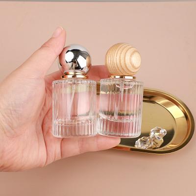 Cina Spray portatile per profumo in bottiglia da 30 ml 50 ml in vetro vuoto di noce in vendita