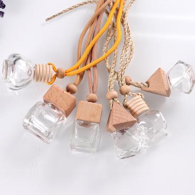 Cina diffusore d'attaccatura della bottiglia di profumo dell'automobile di legno del cappuccio 10ml trasparente in vendita