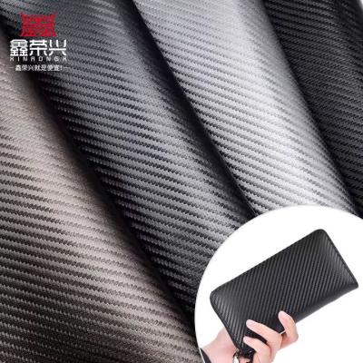 China 1.0mm Thick Carbon Fiber PU Synthetic Leather for Bags Wallets Belts Car Boutiques Faux Leather Material for sale