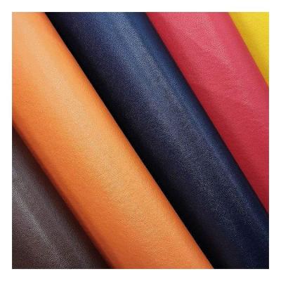 China Venta al por mayor Pvc de cuero falso Bolso de caja de zapatos Cuaderno de notas Patrón de agujero de alfiler Tejido de cuero sintético artificial en venta